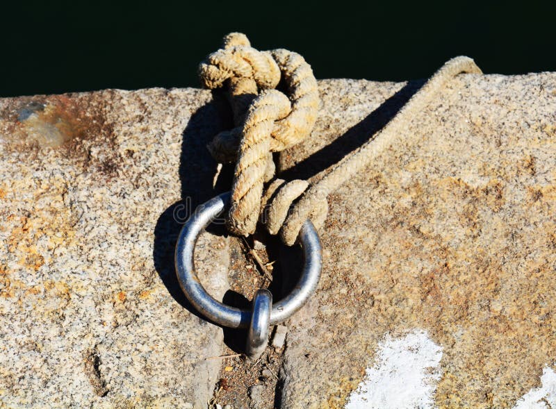 Ropes and ring for ships stock image. Image of rock, ring - 98882023