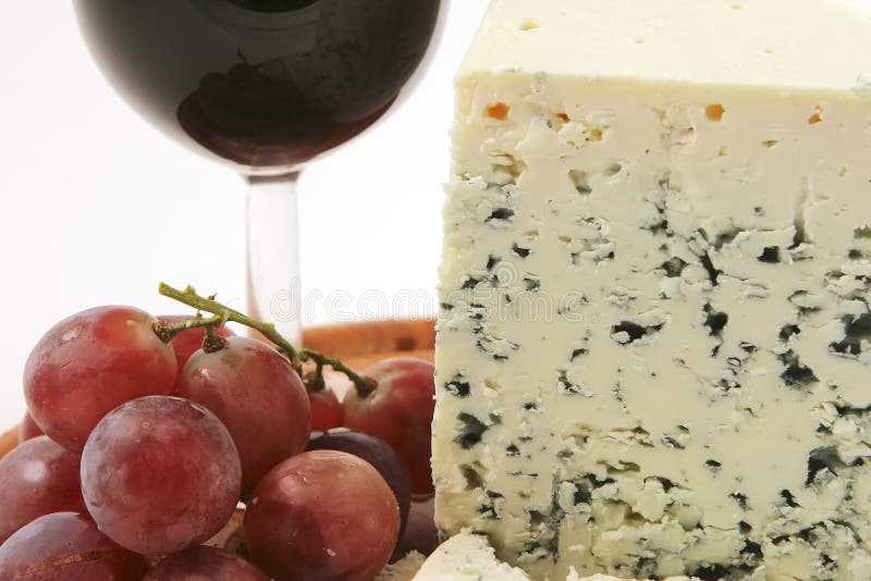 Blue cheese and grapes stock photo. Image of close, milk - 14384894