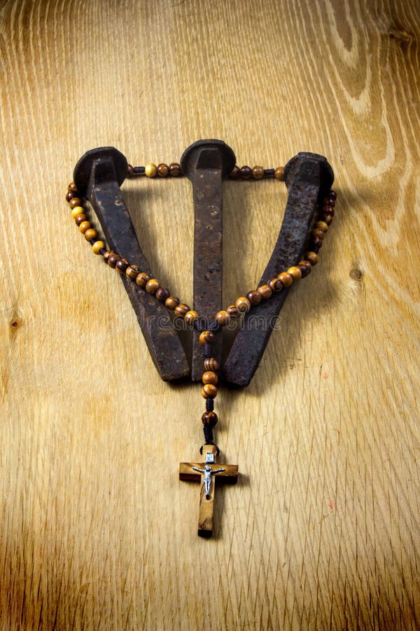 Crucifix, Rosary and Three Spikes Stock Photo - Image of catholicism ...