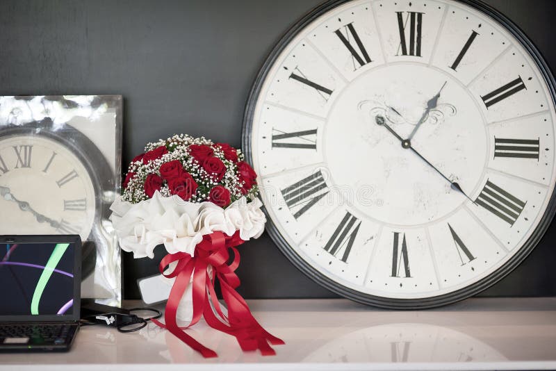 Rose of Bouquet Near a Clock Stock Photo - Image of memory, love: 196001742