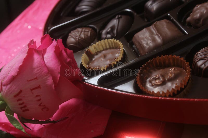 Rose and Box of Assorted Chocolates for Valentines Day Stock Image ...