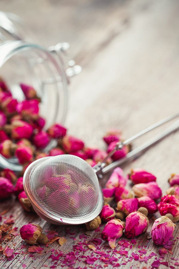 Rose Buds Tea, Tea Strainer and Glass Jar Stock Image - Image of ...