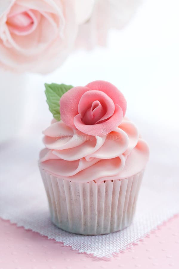 Rose cupcake stock photo. Image of tabletop, iced, eating - 13088658