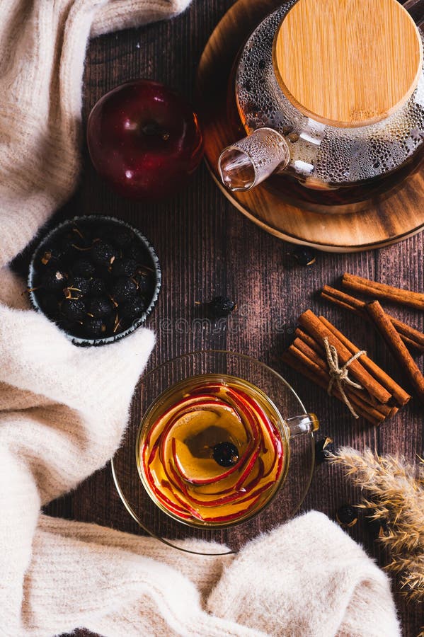 Rose Flower Made from Apple Pieces in a Cup of Tea with Rose Hips Top ...