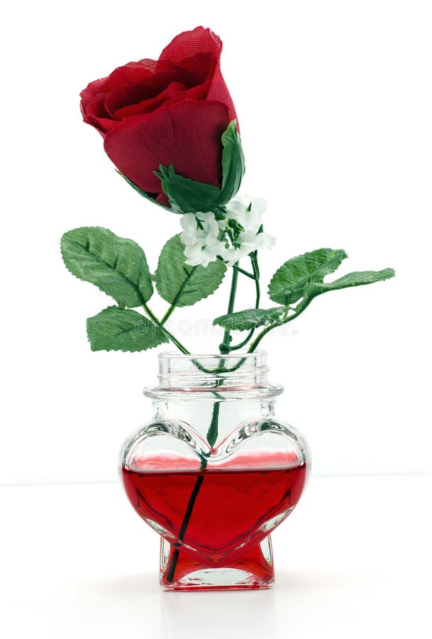 A Rose in a Heart Shaped Bottle Stock Photo - Image of white ...