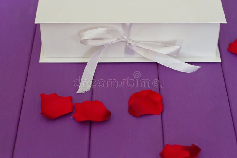 Rose petals and gift box stock photo. Image of petal - 97916566