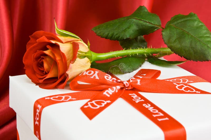 Rose on the present. stock image. Image of rings, heart - 17792535