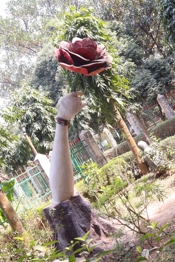 Rose Statue with Hand on Garden Stock Image - Image of passion, gift ...