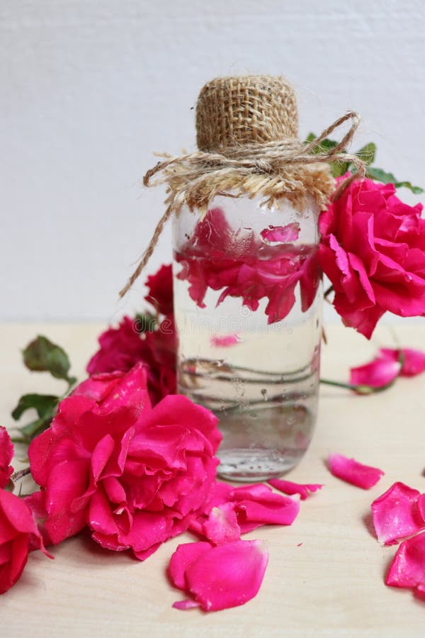 Rose water photo stock photo. Image of pink, flora, bottle - 190748094