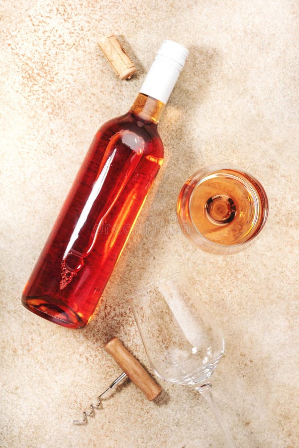 Rose Wine Glass with Bottle on the Beige Table. Copy Space, Top View ...