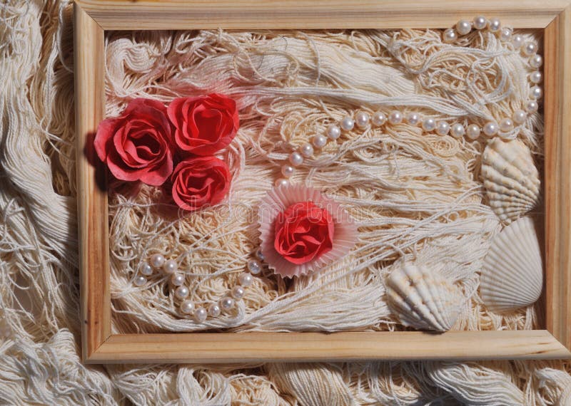 Rose, Wooden Frame, Pearl Beads and Shells on Threads Background Stock ...