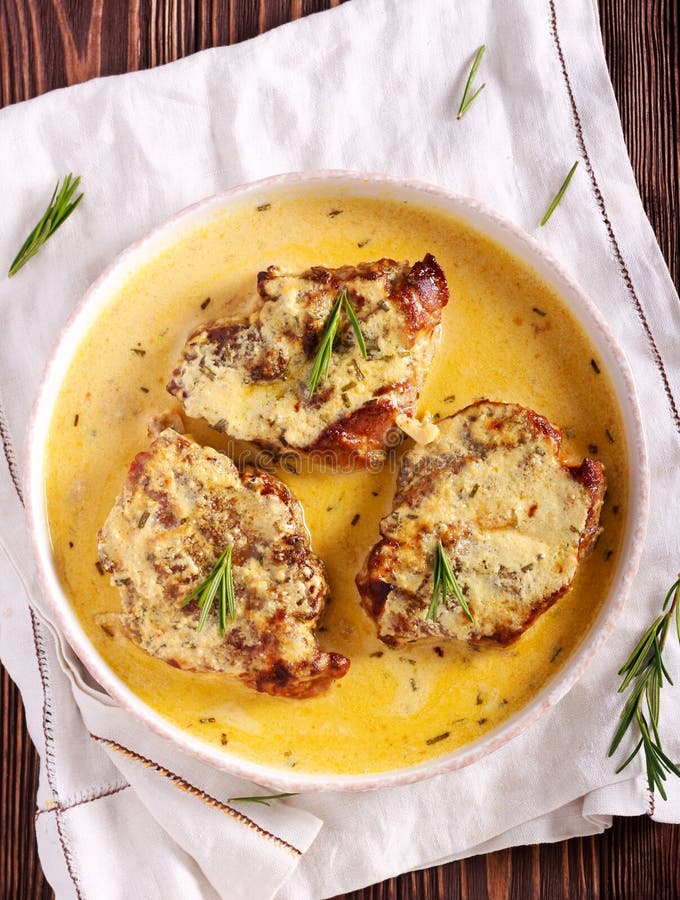 Rosemary Pork Chops in Creamy Sauce Stock Image - Image of gravy, chops ...