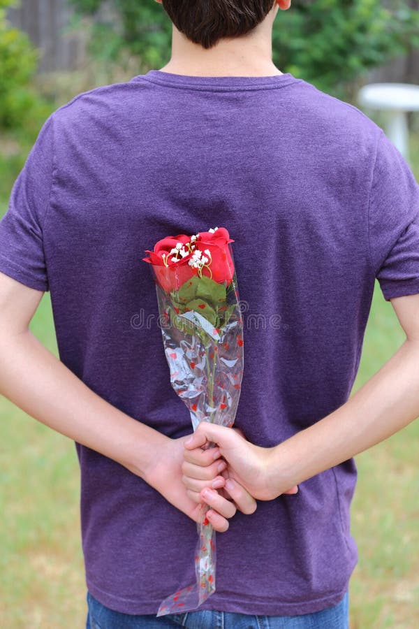Roses Behind the Back stock photo. Image of love, cheerful - 33263844