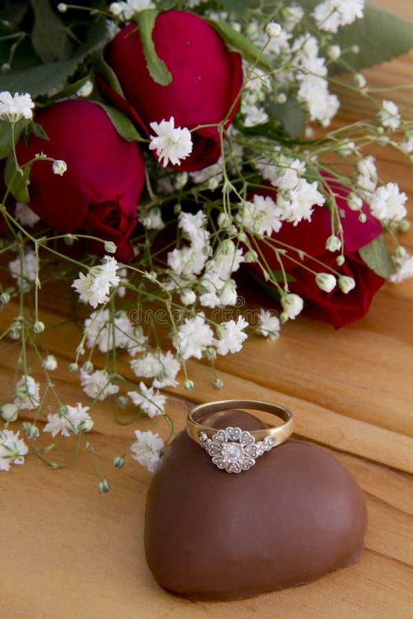 Roses with Diamond Ring on Heart Chocolate Stock Image - Image of ...