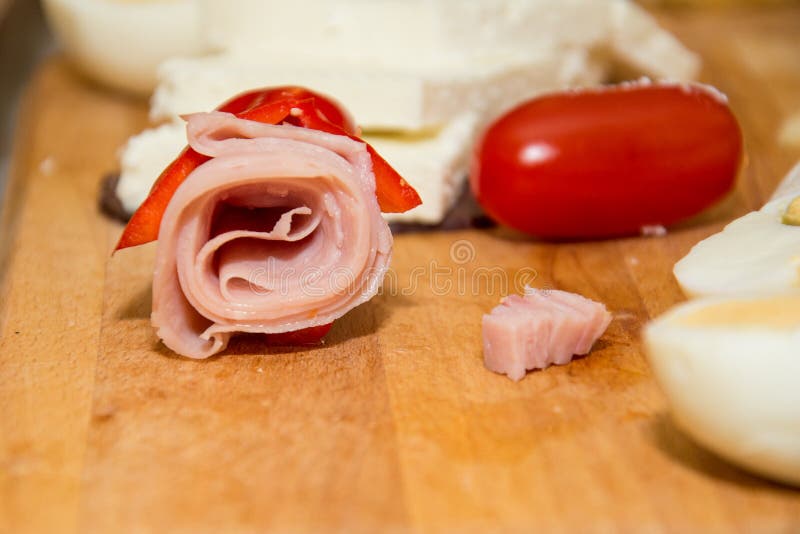 Roses of ham and peppers stock photo. Image of slice - 104352298