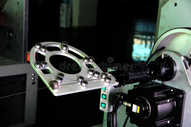 CNC SPRING COILER stock image. Image of axis, length - 127952093