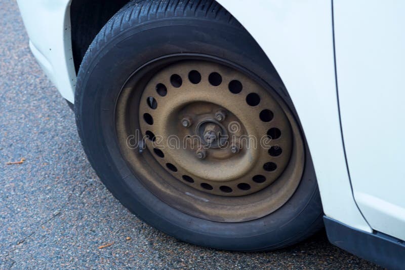 Rotated Front Wheel of a Car without a Cap with a Rusty Rim Stock Image ...