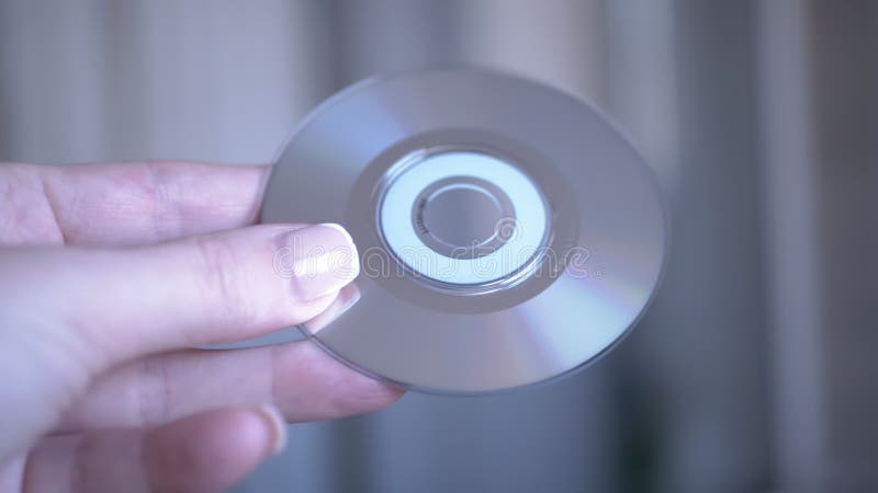 Rotating CD Close-up in Hand Stock Video - Video of music, detail ...