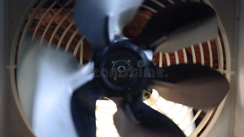 Rotating fan in the dark stock footage. Video of movement - 143242124
