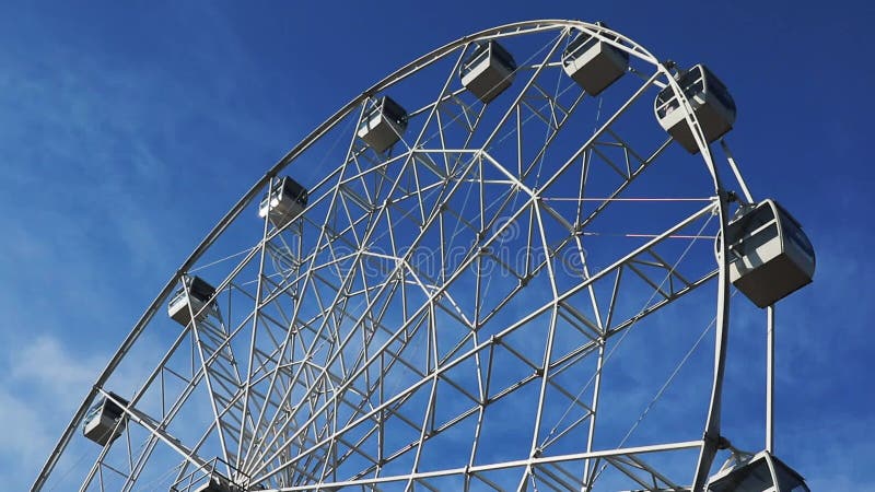 Rotating Ferris Wheel Against the Blue Sky Stock Video - Video of ...