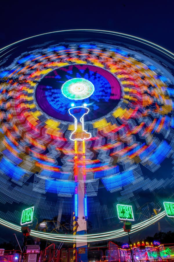 Rotating Funfair Ride at Night, Light Trails, Long Exposure Editorial ...