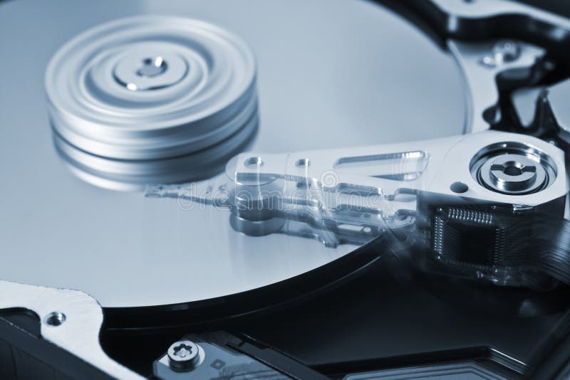 Rotating Hard Disk Drive with Moving Head Stock Photo - Image of ...