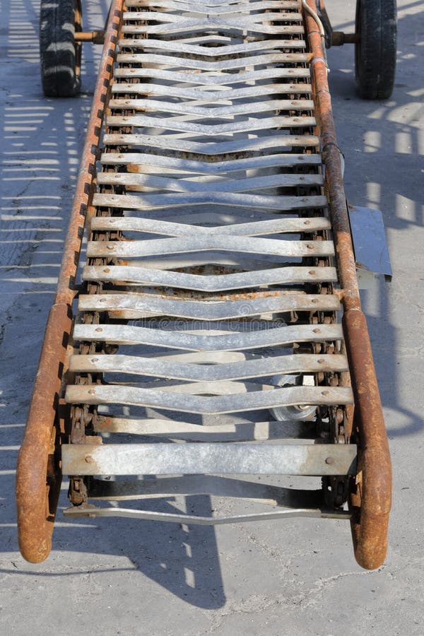 Rotating lifting carpet stock photo. Image of peach, reel - 98042216