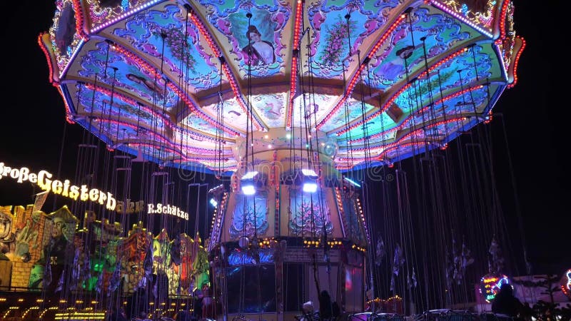 The Chain Carousel Spins in a Circle. Amusement and Recreation Park ...