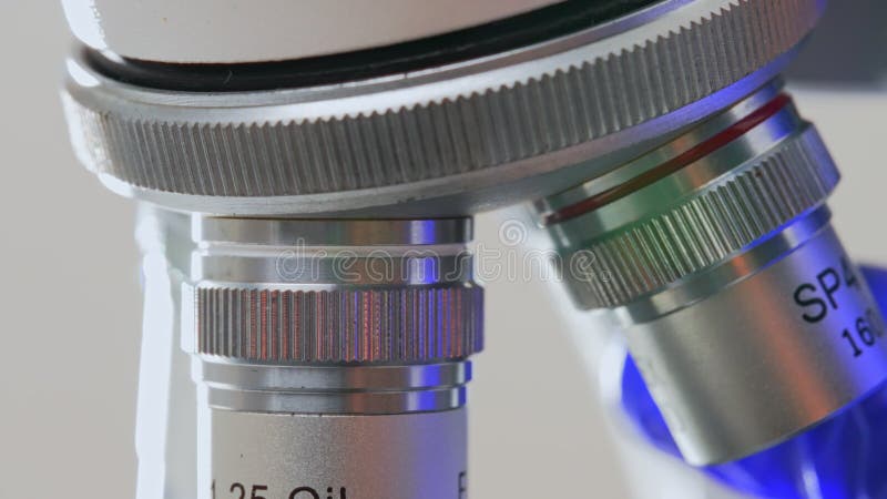 Changing the Magnification of Microscope. Stock Footage - Video of ...