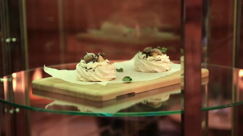 Rotating Plate with Two Cakes in Sweets Shop Stock Footage - Video of ...