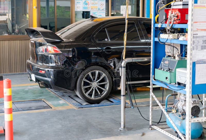 Rotating Rear Wheel on Roller Brake Tester Stock Photo - Image of ...