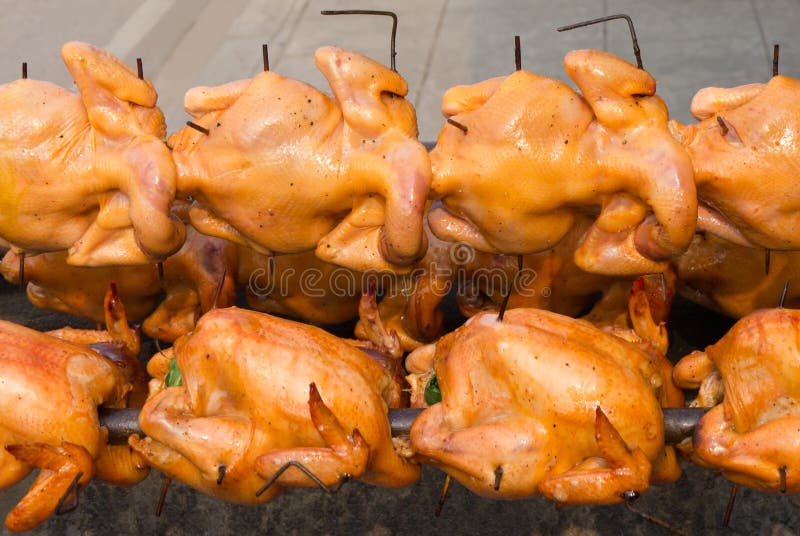 Rotating roast chicken. stock image. Image of meal, eating - 20715955