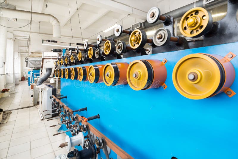 Rotating Rubberized Wheels of the Winding Machine. Stock Image - Image ...