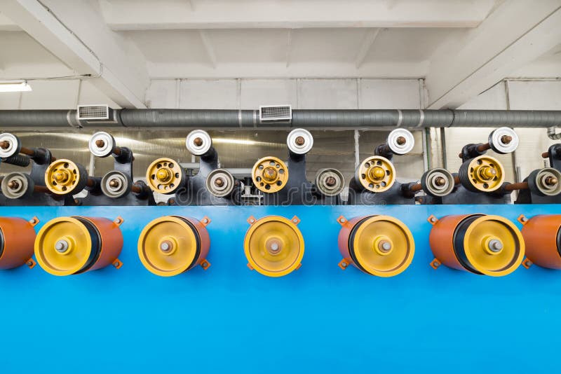 Rotating Rubberized Wheels of the Winding Machine. Stock Photo - Image ...