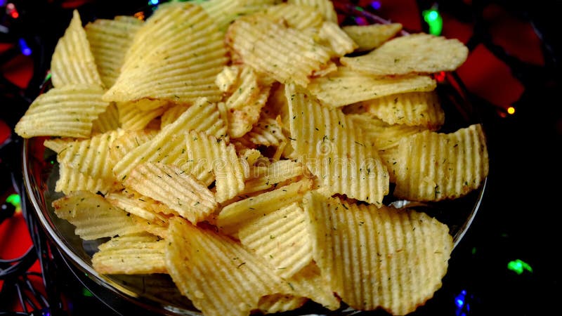 Rotating Ruffled Potato Chips with Dill. Close-up Stock Footage - Video ...