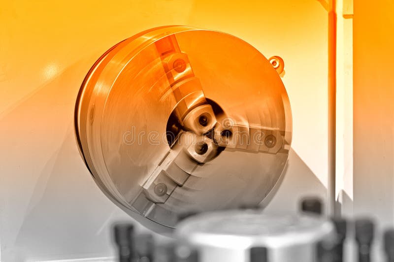 Rotating Spindle of the Industrial Lathe.Red Toning Stock Image - Image ...