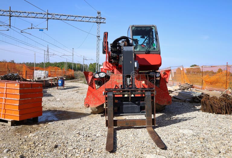 Rotating Telehandler with Forklift Attachment during Railroad ...