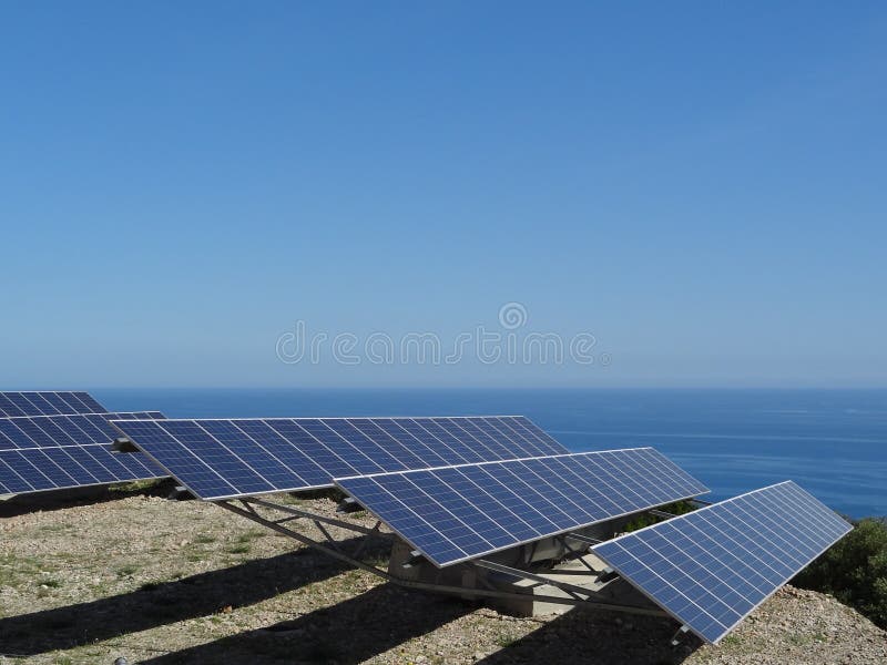 Solar panels by sea stock image. Image of water, energy - 24635199