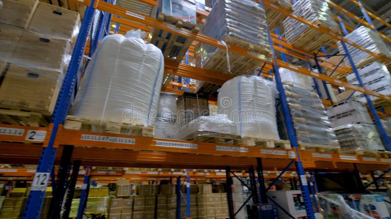 A Rotating View from between Two Warehouse Rack Rows. Stock Footage ...