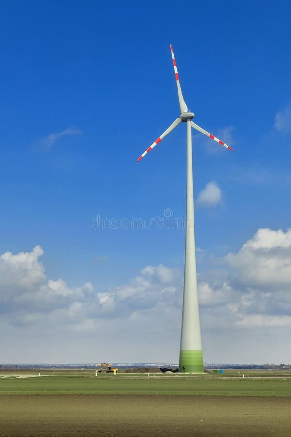 Rotating Windmill Blades in Blue Sky Stock Photo - Image of blue ...