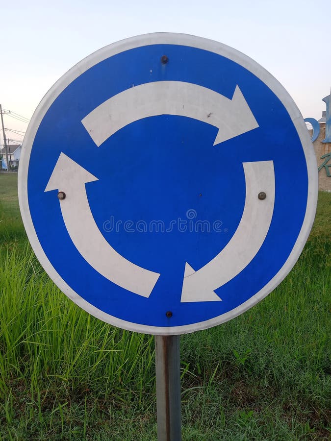 Rotation Sign with White Arrow and Blue Circle Stock Photo - Image of ...
