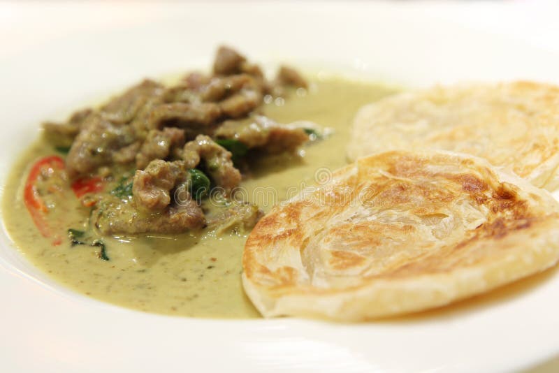 Roti with beef green curry stock photo. Image of cuisine - 136991584