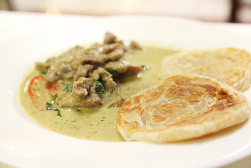 Roti with beef green curry stock photo. Image of green - 136991590