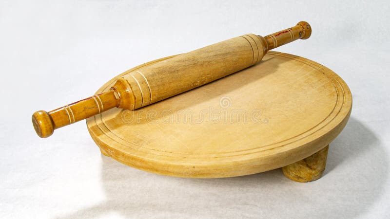 Roti or Bread Cutting and Flatting Board with Rolling Pin. Stock Image ...