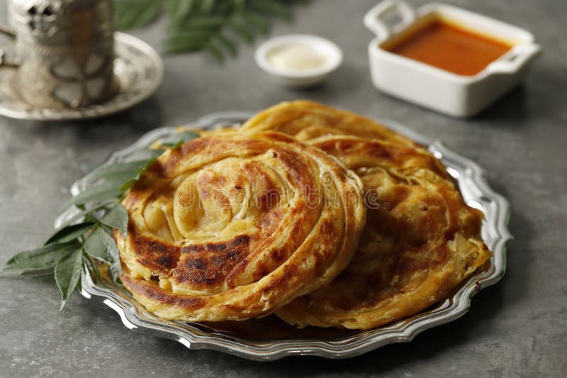 Roti Canai or Paratha with Chicken Curry Stock Image - Image of india ...