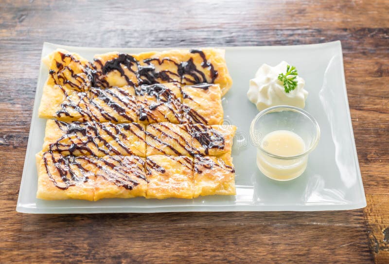 Roti with chocolate sauce stock photo. Image of sweet - 117881086