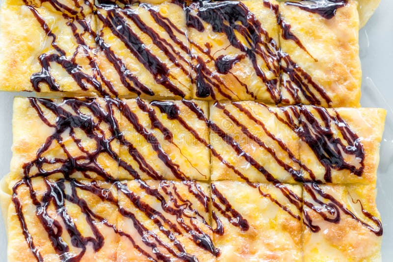 Roti with chocolate sauce stock photo. Image of condensed - 119083304