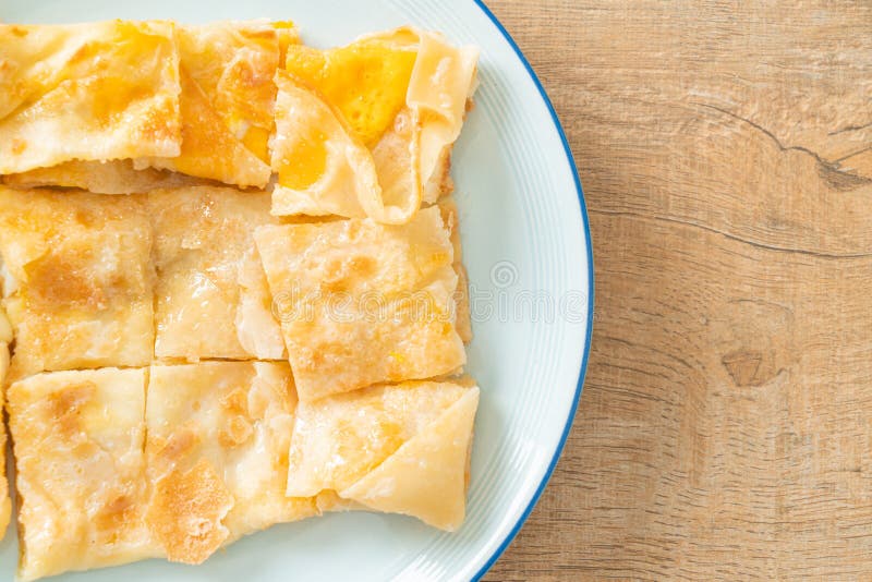 Roti with Egg and Sweetened Condensed Milk Stock Photo - Image of flat ...