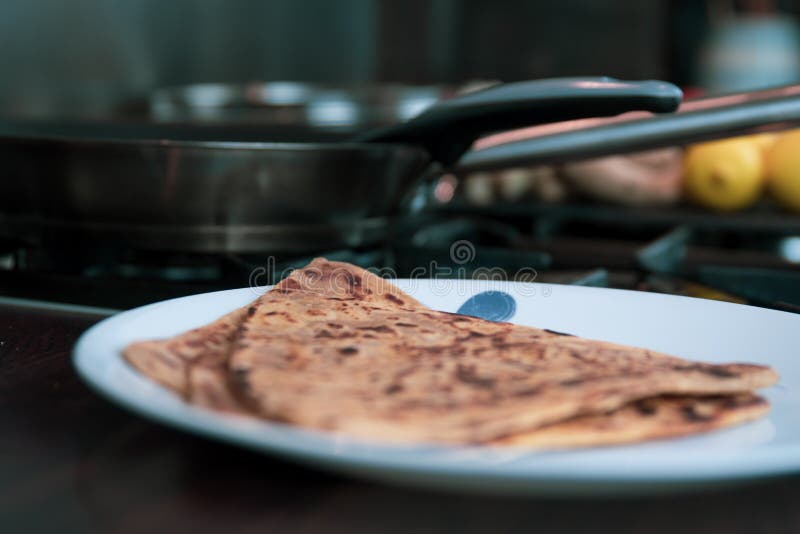 Roti or Flat Bread - Being Made Fresh in a Shallow Pan. Stock Image ...
