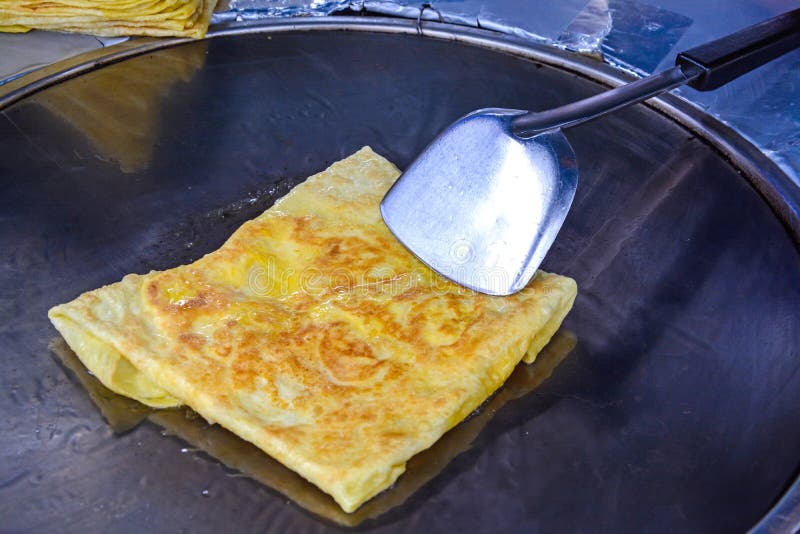 Roti frying stock image. Image of butter, knead, cuisine - 46670763